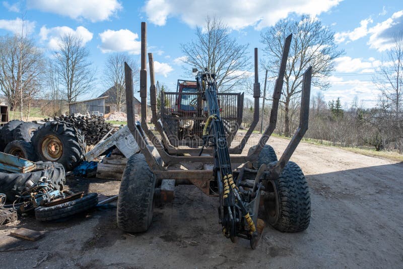 The Harvester Working in a Forest. Tree Removal Equipment Stock Photo ...