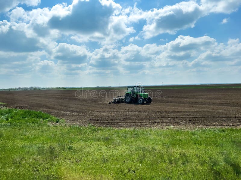 Harvesting Machine in the Field Stock Photo - Image of green ...