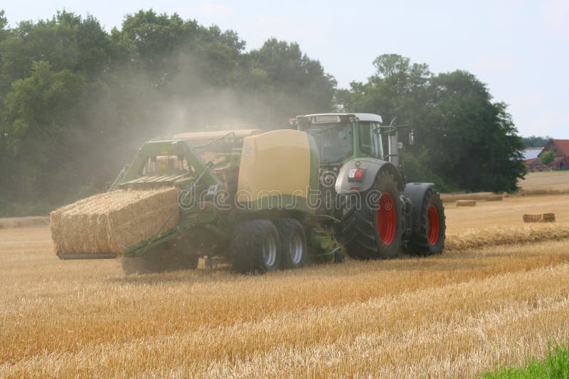 Harvesting - Straw Bale Press Stock Image - Image of economics, tractor ...