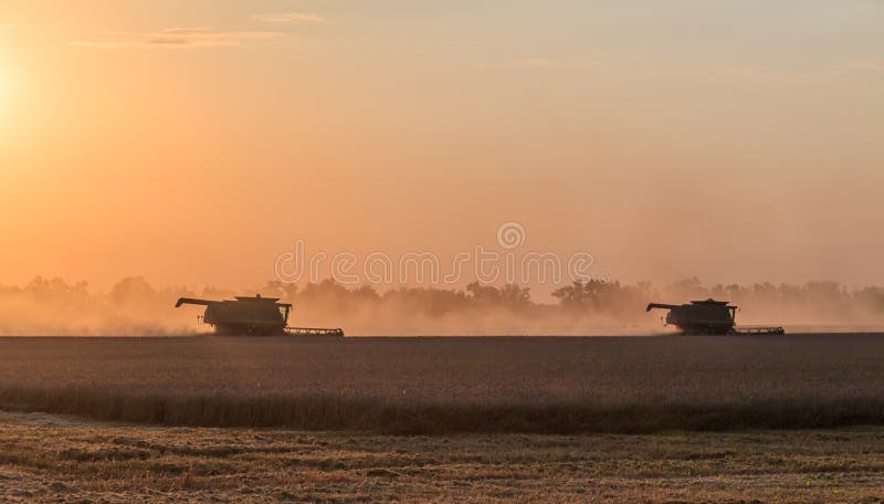 Combine and sunset stock image. Image of agriculture - 76796531