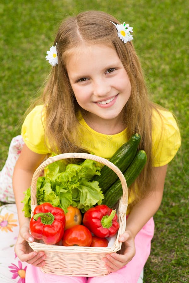 Harvests of Vegetables - Smiling Girl with Basket of Vegetables Stock ...