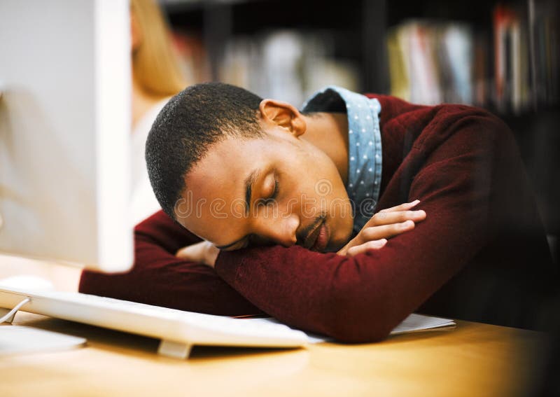 Student Sleeping At Desk