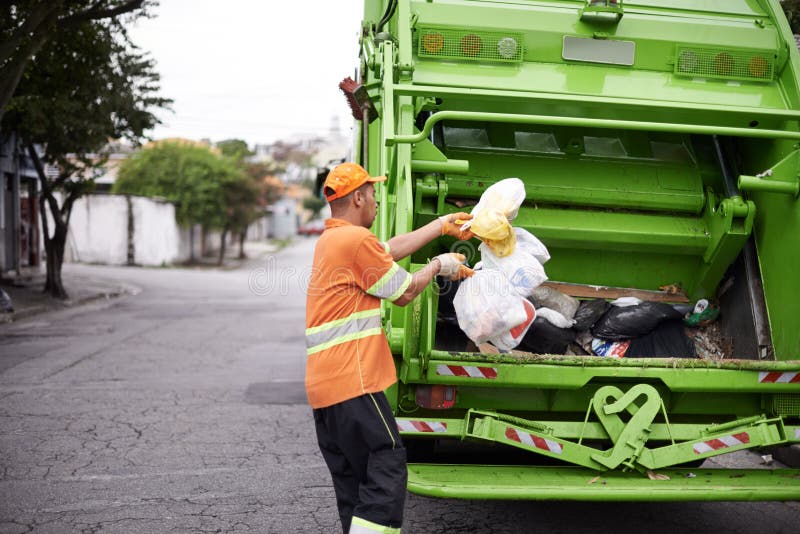 It Has To Go Somewhere. a Busy Garbage Collection Worker. Stock Photo ...