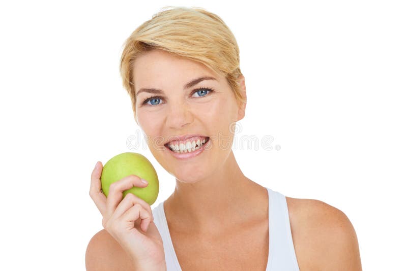 She Has To Stick To Her Eating Plan. a Young Woman Holding an Apple ...