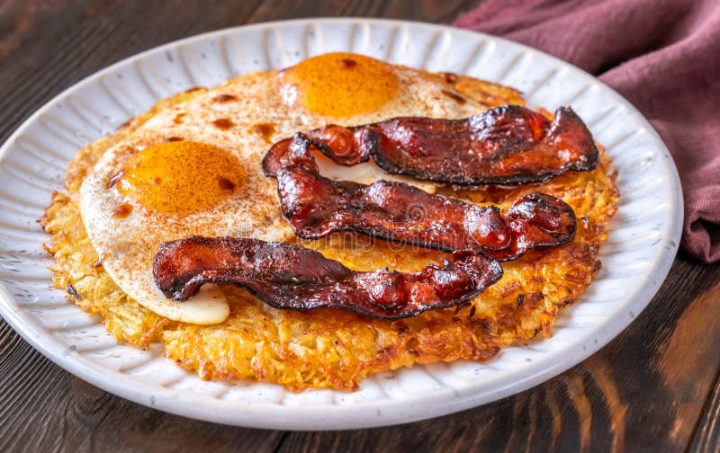 Hash Brown with Egg and Bacon Stock Photo - Image of onion, vegetable ...
