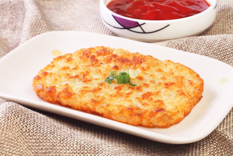 Hash browns stock photo. Image of catsup, hashed, loaf - 261834078