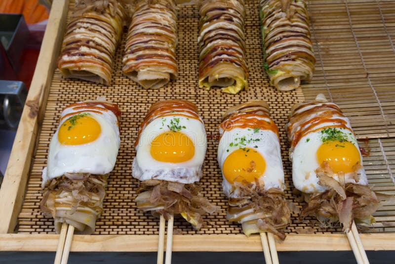 Hashimaki Japanese Salty Pancake with Teriyaki Sauce on a Chopstick ...