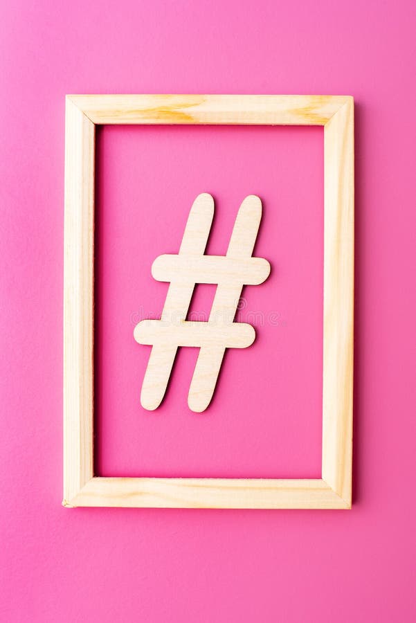 Hashtag Sign Made of Wooden Material in Frame on Pink Background Stock ...