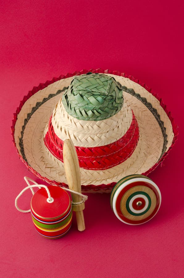 Festive Mexican Objects: Handmade Doll and Tricolor Tie Bow Next To ...
