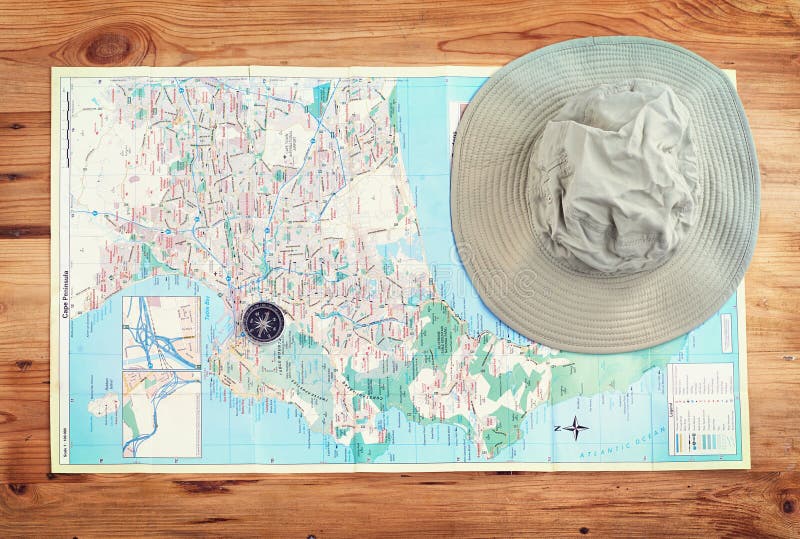 Hat, Map and Above with Compass on Table for Itinerary Schedule ...