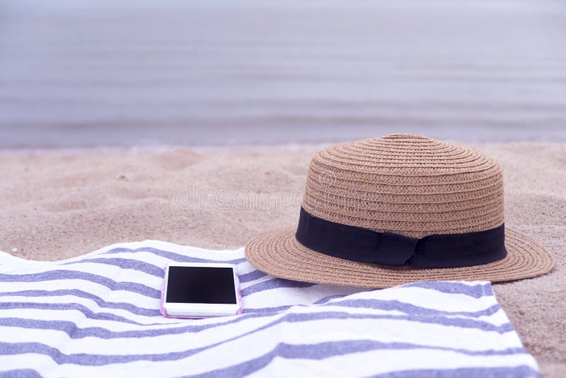 Hat and Smart Phone on the Beach. Stock Image - Image of sunglasses ...