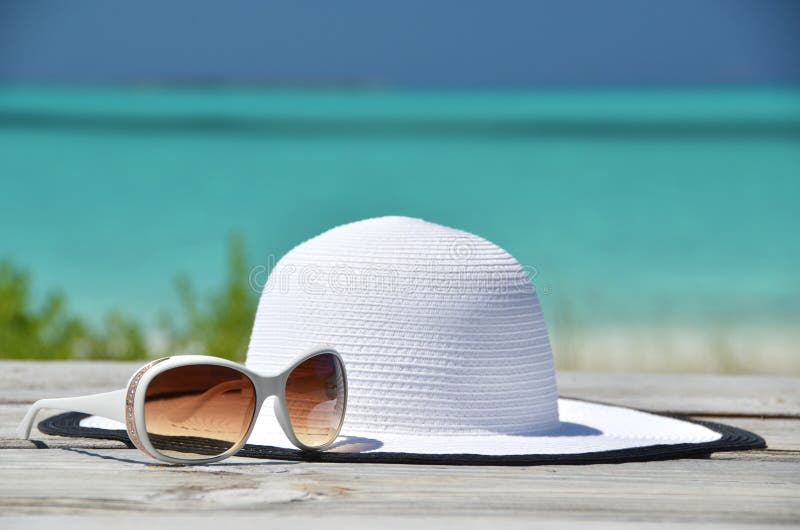 Hat and sunglasses stock image. Image of glasses, beauty - 31497943