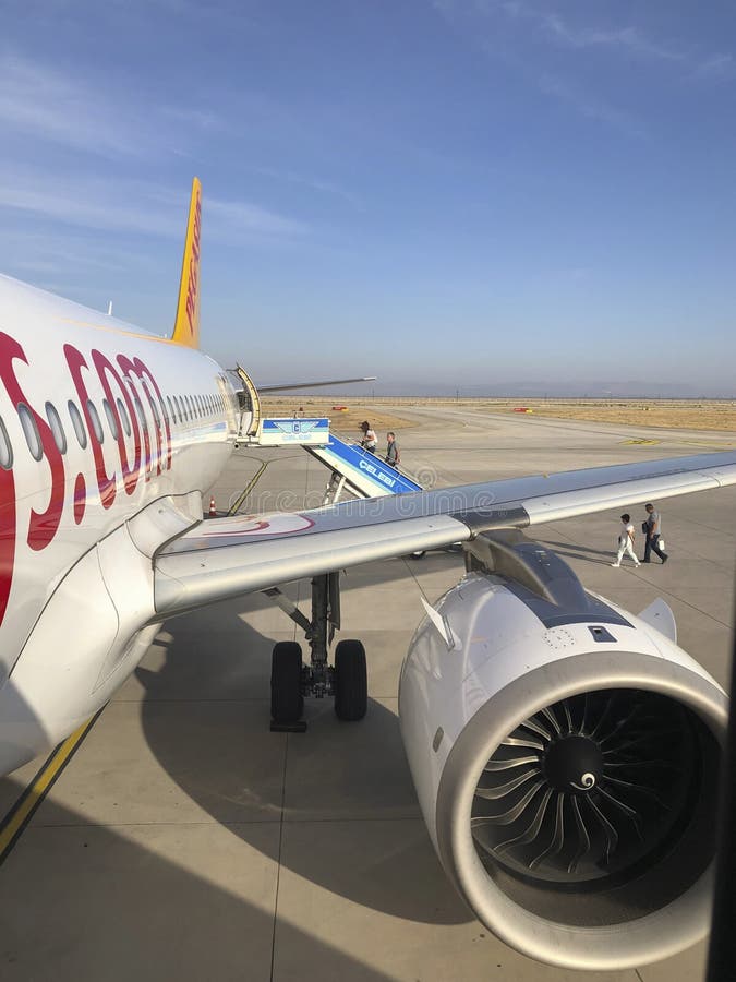 People Getting on the Plane of Pegasus Airlines in Turkey Editorial ...