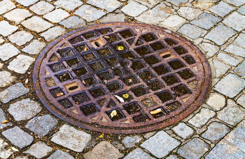Hatch Cover, City Drain on the Road, City Sewerage Stock Photo - Image ...