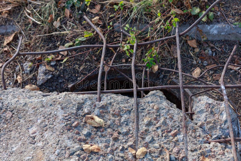 The Hatch with an Underground Passage is Closed by a Broken Concrete ...