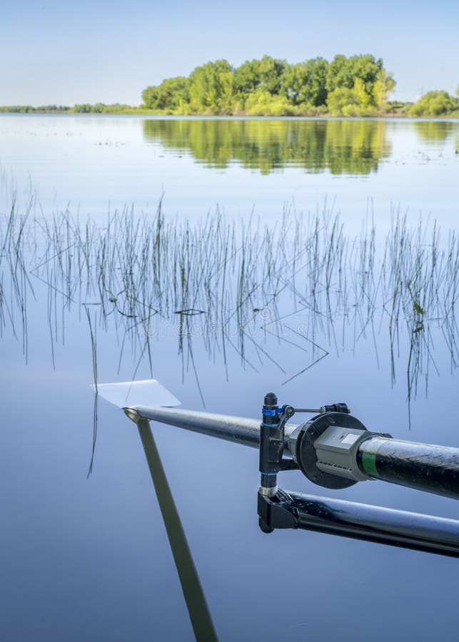 Hatchet Sculling Oar on a Calm Lake in Colorado Stock Photo - Image of ...