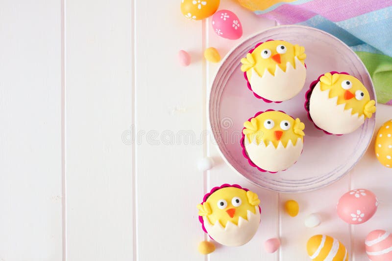 Hatching Spring Chick Cupcakes, Above View Side Border Over White Wood ...