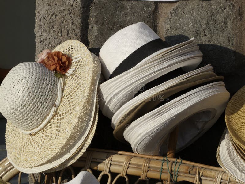 Amish Bonnet and Straw Hat Hanging on Wall Stock Photo - Image of hook ...