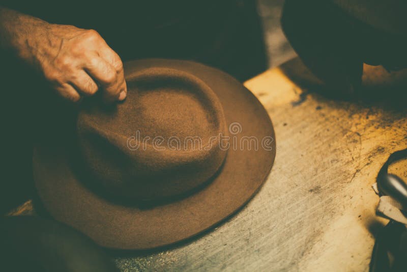Hatter making a hat stock photo. Image of trimming, close - 89566682