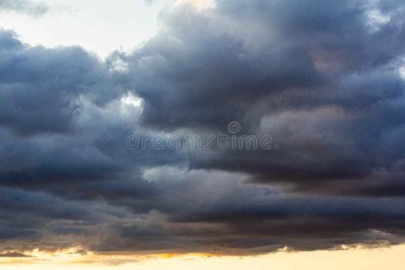 A Haunting Stormy Sky. Cloudy Clouds in the Setting Sun Stock Photo ...