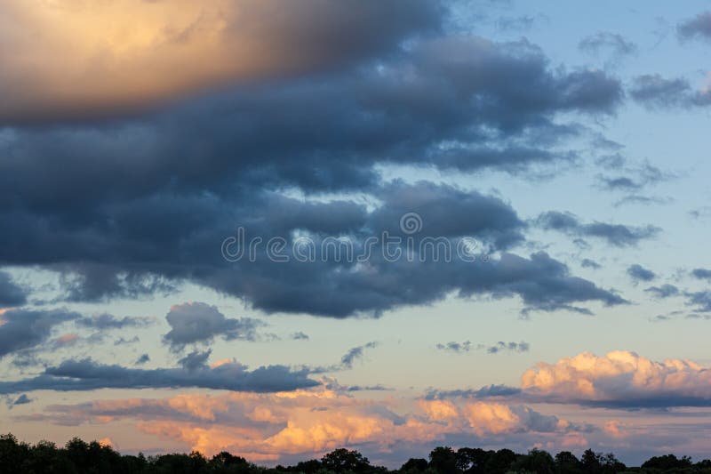 A Haunting Stormy Sky. Cloudy Clouds in the Setting Sun Stock Image ...
