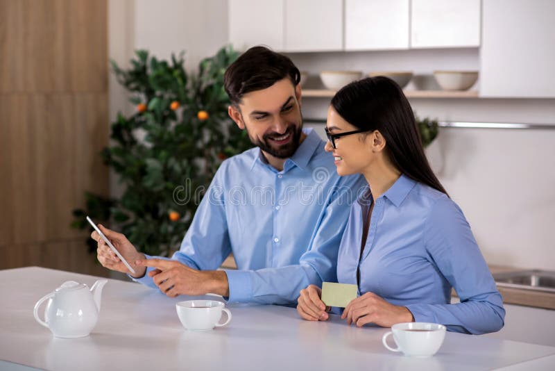 Cheerful Business Colleagues Drinking Tea in the Kitchen Stock Photo ...