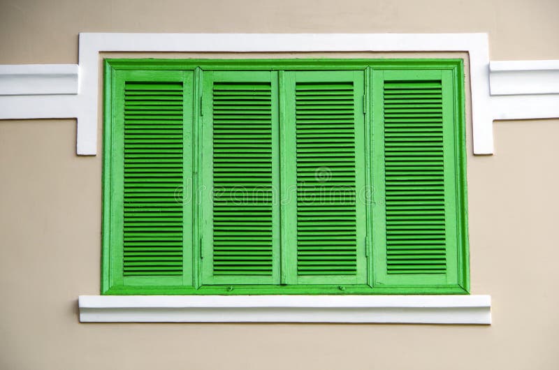 Green windows in the wall stock photo. Image of architecture - 121117652