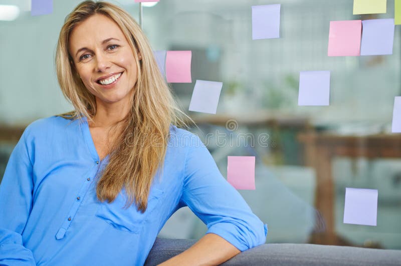 Have You Seen Our Sticky Note Wall. an Attractive Female Smiling in ...