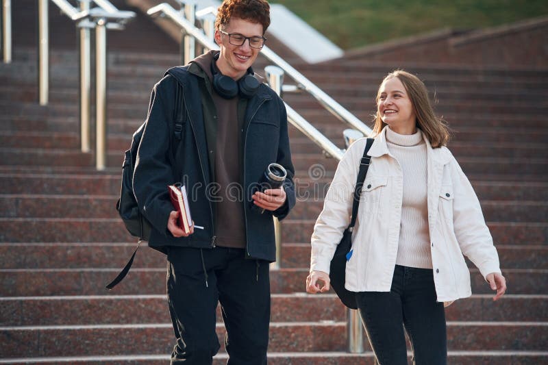 Having a Break. Two Young Students are Together Outdoors Stock Photo ...