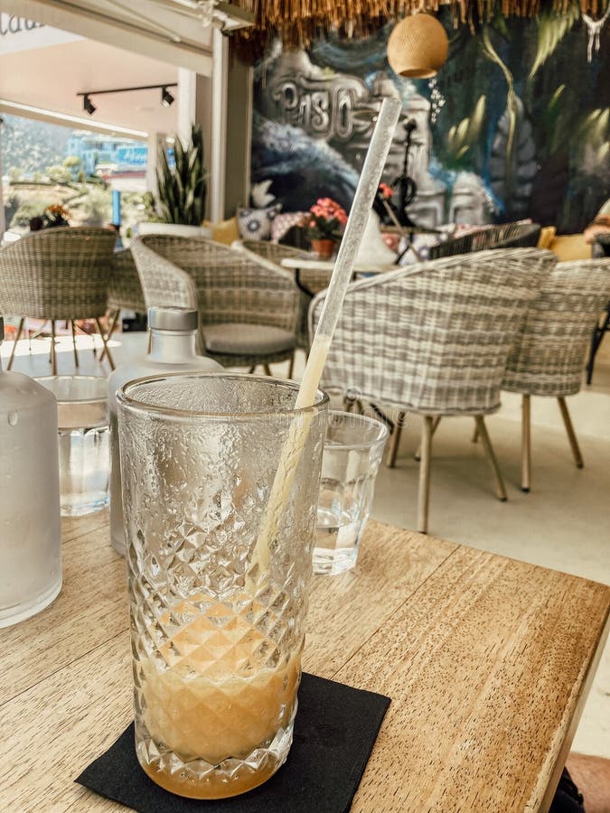 Having Drinks in a Bar in Bali, Crete Stock Photo - Image of tableware ...