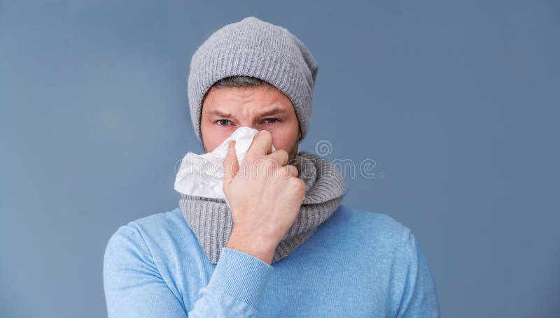Sneezing man with cold stock image. Image of headache - 80983507