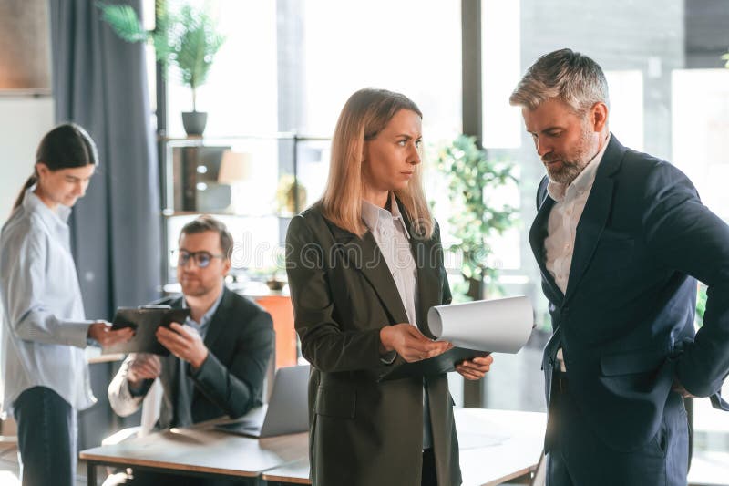 Having Conversation, Talking about Plan. Group of Business People are ...