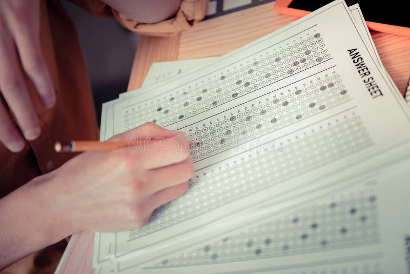 Student Having a Big Test with Closed-coded Answers Stock Image - Image ...