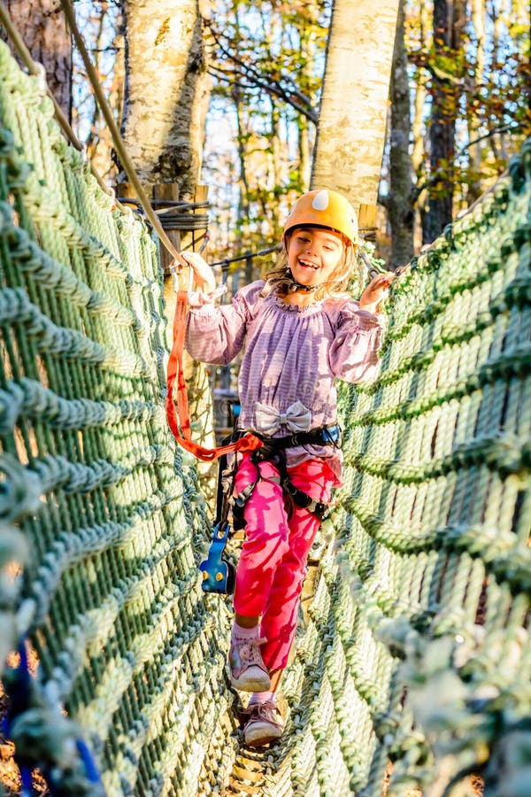 Having Fun in Adventure Park Stock Image - Image of elementary, girl ...
