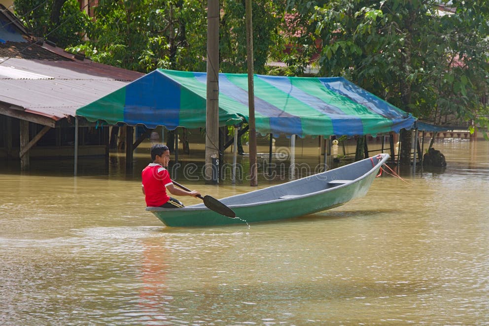 Having Fun with Boat in Flood Editorial Stock Image - Image of village ...