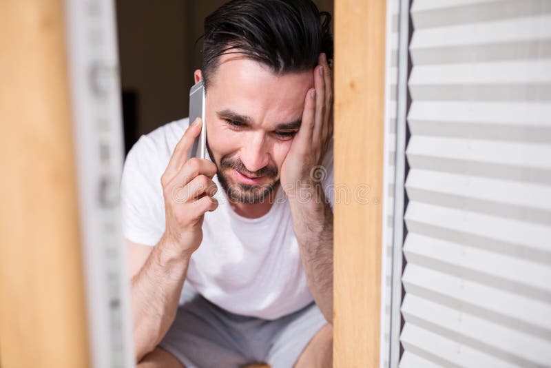 Nice Phone Conversation while Answering E-mails in Kitchen Stock Photo ...