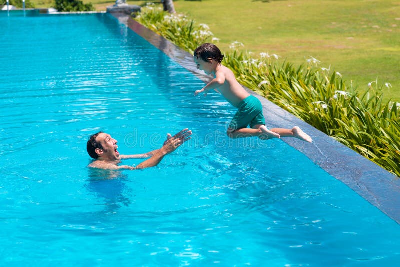 Family Jump To Swimming Pool Stock Photo - Image of daughter, jumping ...