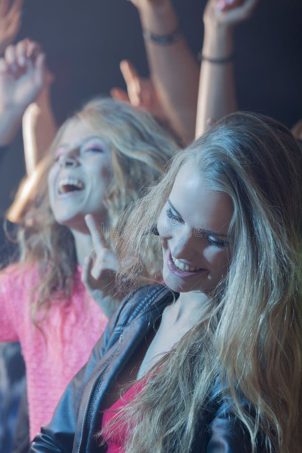 Having fun at rock concert stock image. Image of clubbing - 80723371