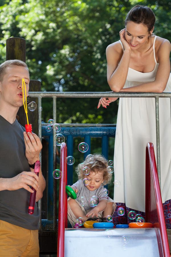 Having Fun with Soap Bubbles Stock Photo - Image of smile, park: 43747614
