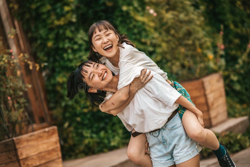 Two Girls Having Fun in the Park and Looking Excited Stock Image ...