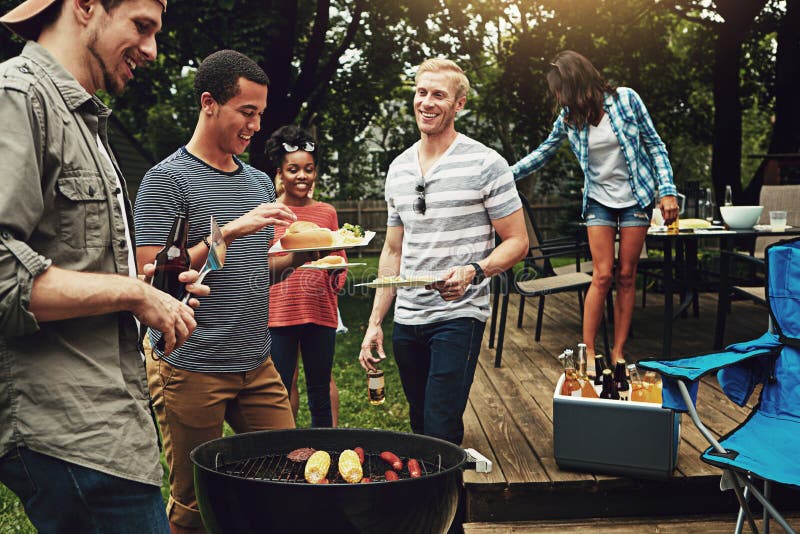 Male Friends Having Good Time Grilling Burgers Stock Photos - Free ...