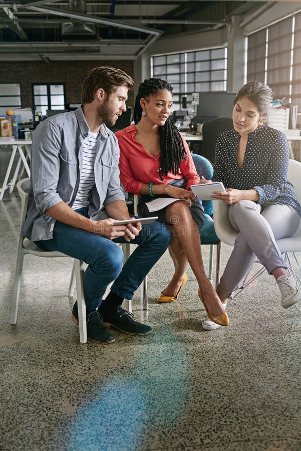 Having an Idea Gathering Session. a Group of Colleagues Having a ...