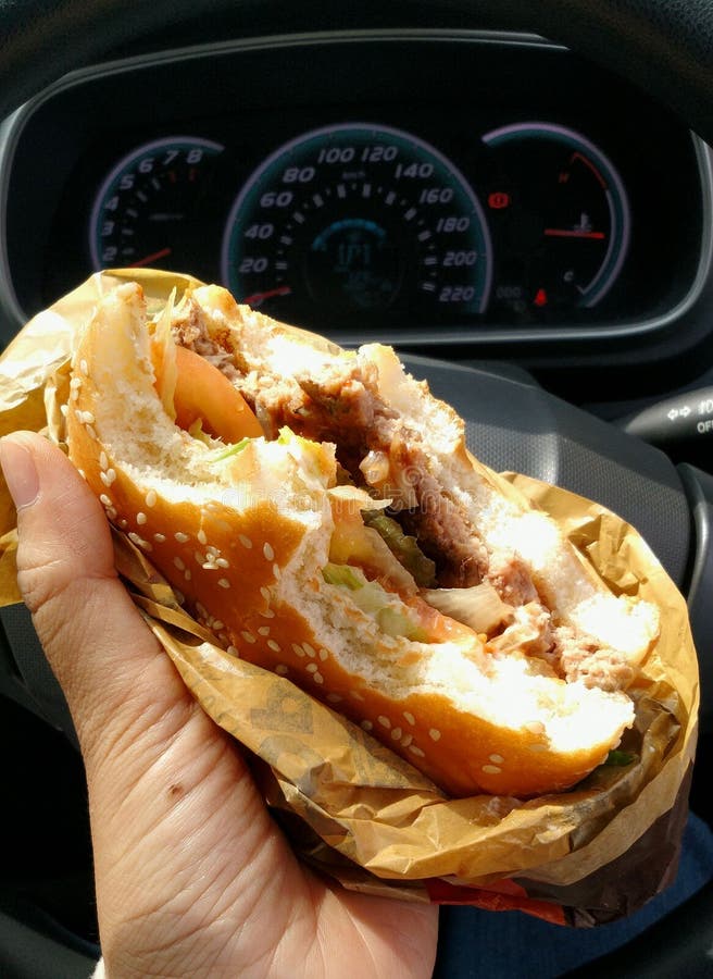 Having lunch in a car stock photo. Image of meat, baking - 185715850