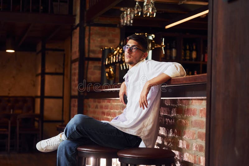 Having a Rest. Man in Casual Clothes Sitting in the Pub Stock Image ...