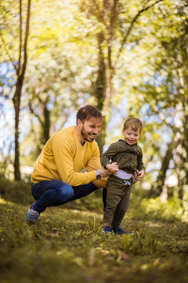 Having some fun with dad stock image. Image of adult - 183259317