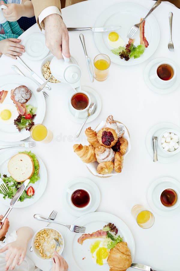Having tea at breakfast stock photo. Image of plate, tablecloth - 93205762