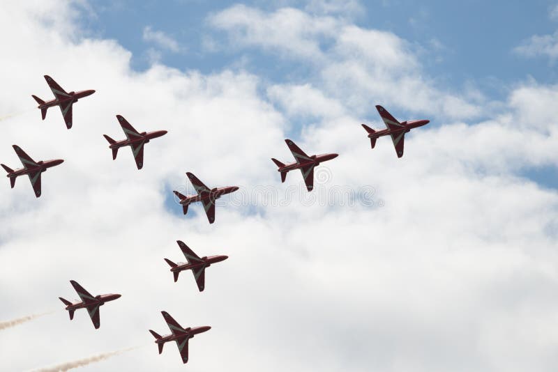 Hawk T1 Jets in Arrow Formation Stock Image - Image of redand, graffiti ...