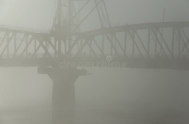 Bridge in the Fog stock photo. Image of lake, silhouette - 36986826