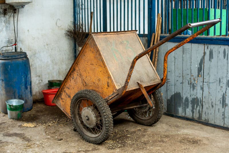 Hay cart in the stable stock photo. Image of wooden - 205001482