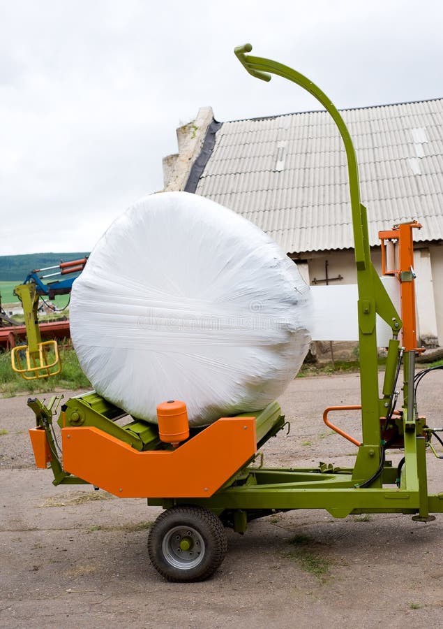 Hay packing machine stock image. Image of cover, packing - 10573097